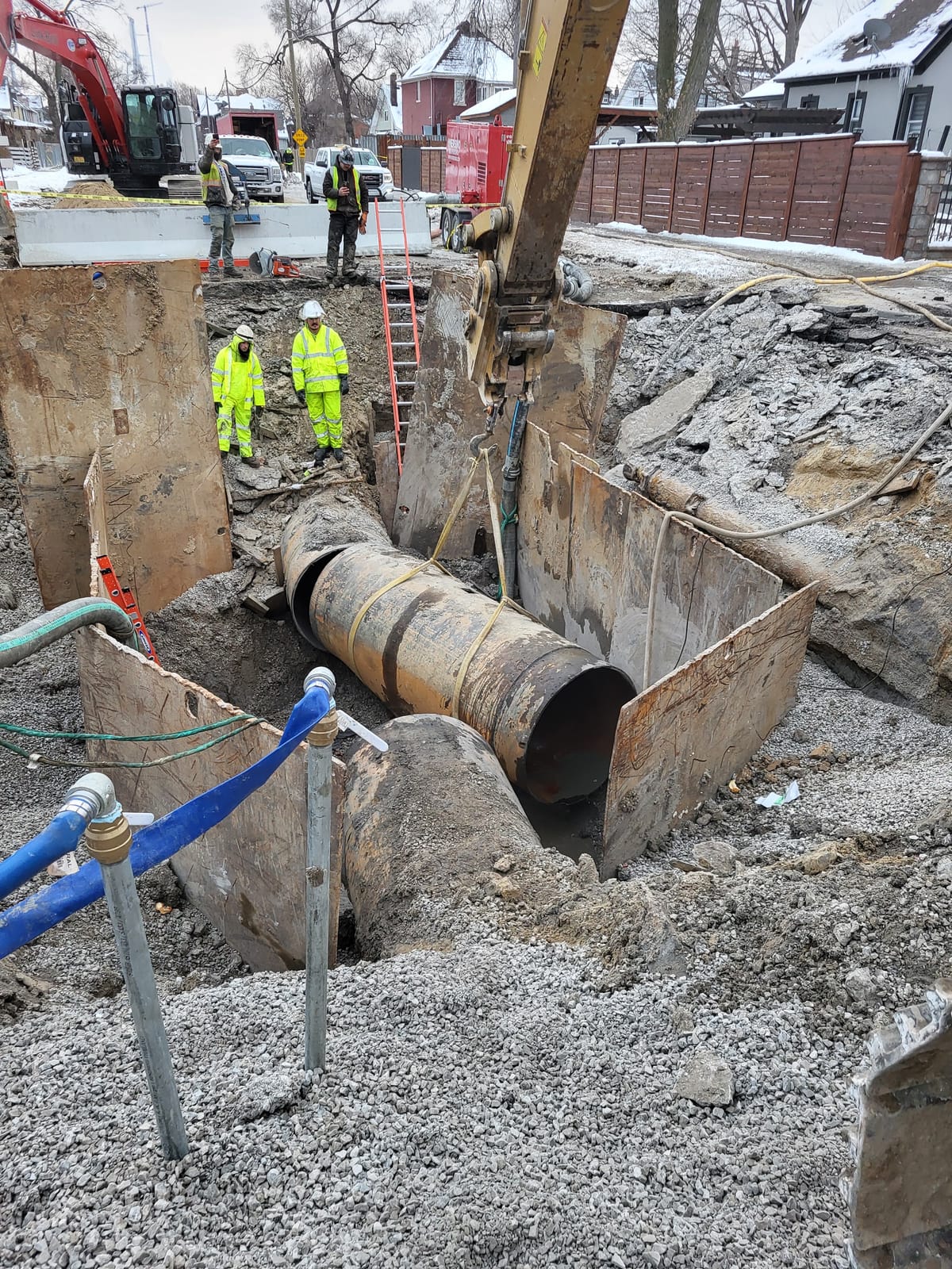 A 19 foot long replacement pipe arrives in Southwest Detroit
